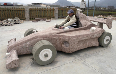McLaren-Mercedes racing car carved in stone