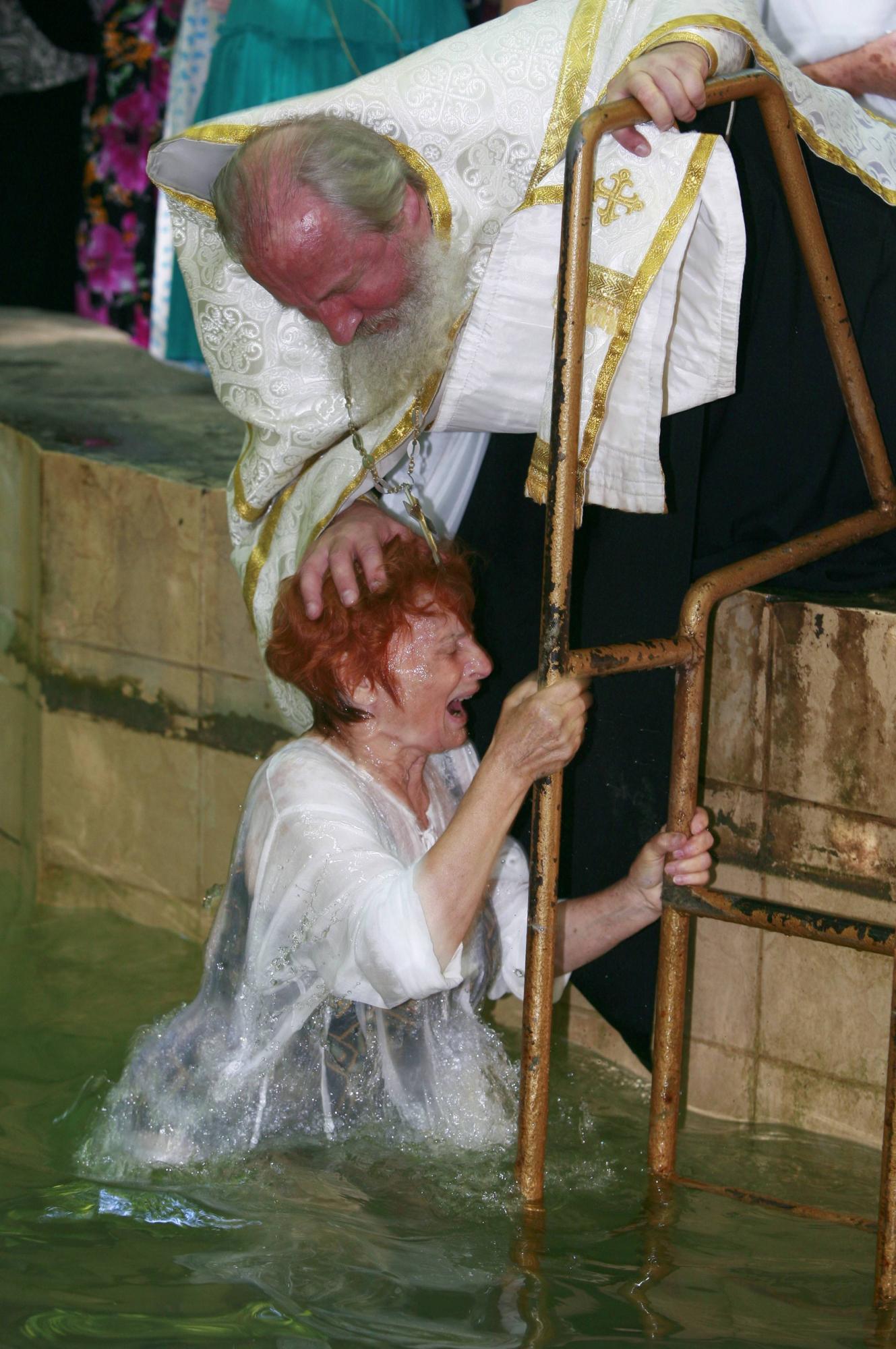 Baptizing to mark Christianity conversion