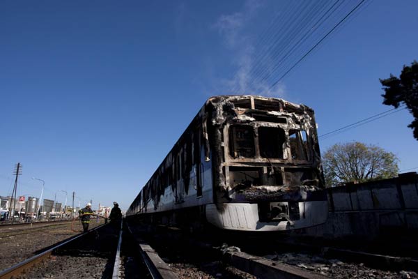 Angry passengers set delayed train on fire